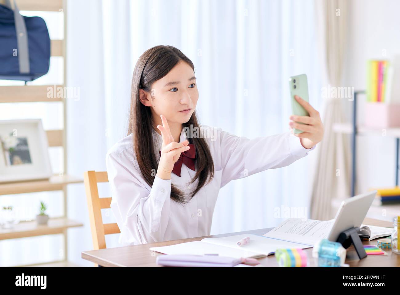 Japanese high school student in uniform studying Stock Photo - Alamy