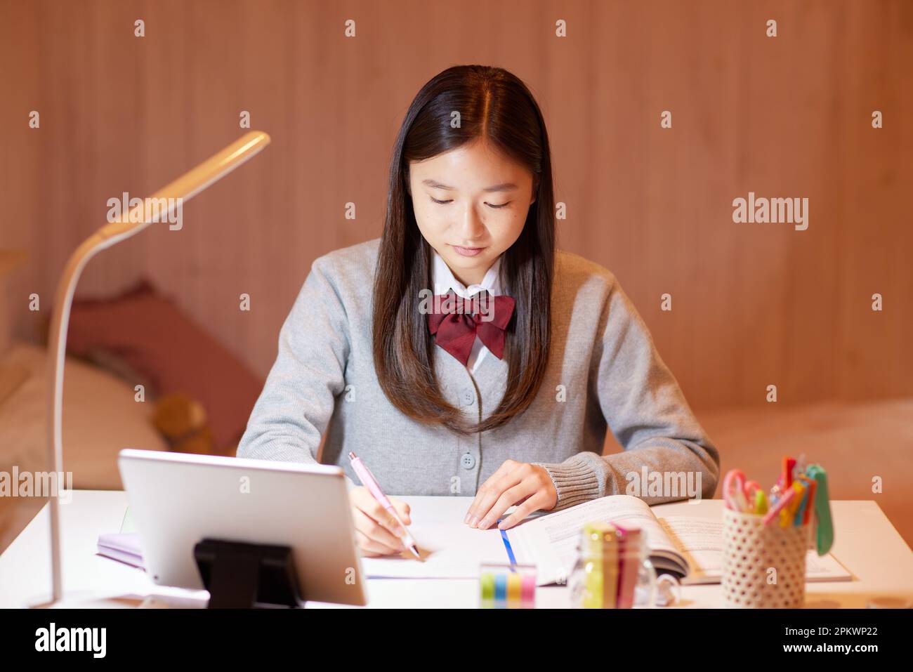 Japanese high school student in uniform studying Stock Photo - Alamy