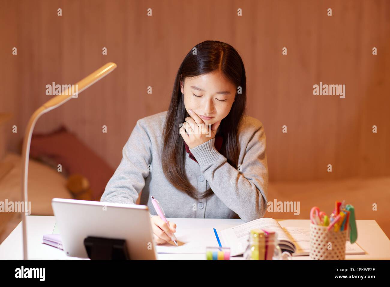 Japanese high school student in uniform studying Stock Photo - Alamy