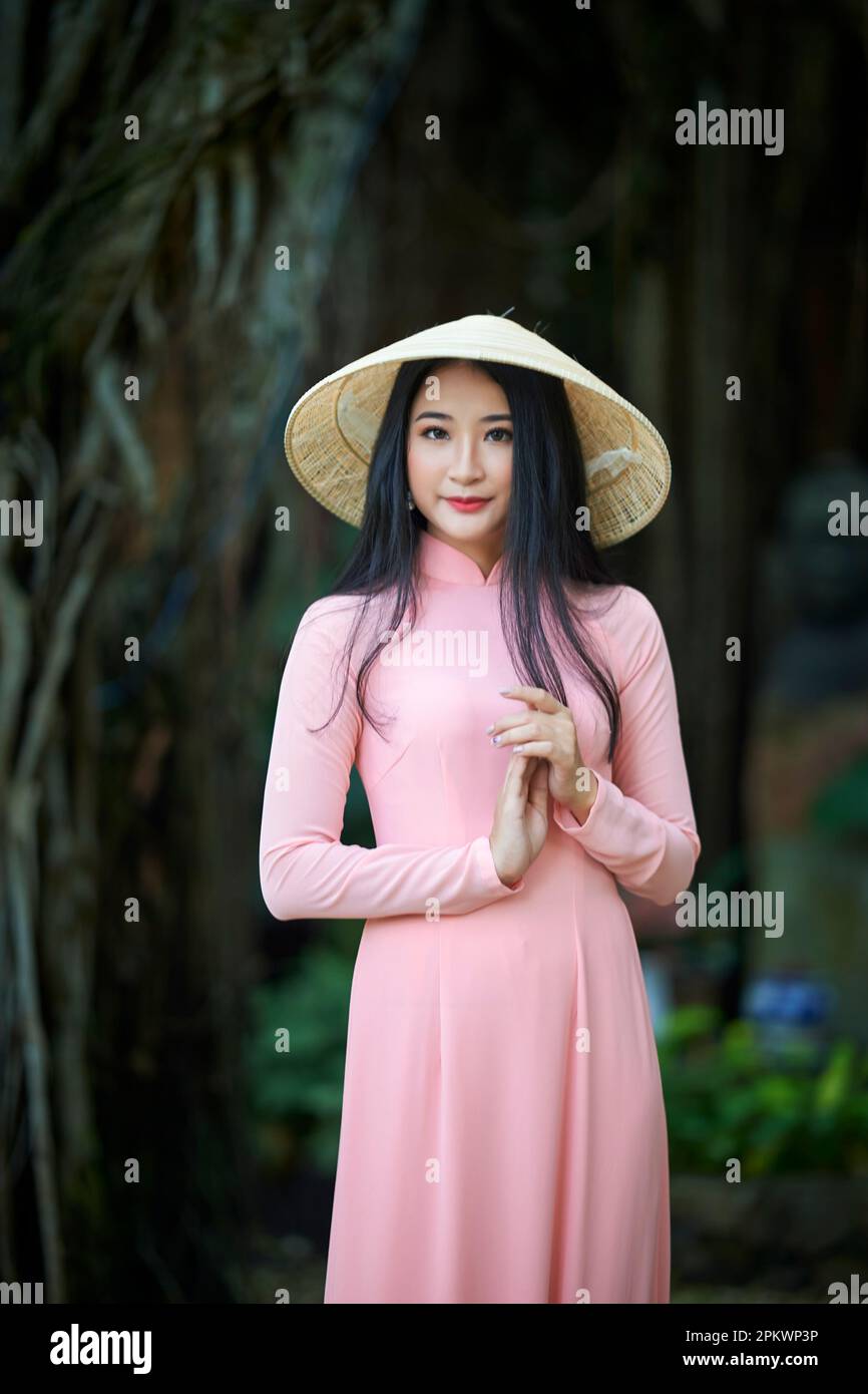 Ho Chi Minh city, Viet Nam: Portrait of a Vietnamese girl wearing a ...