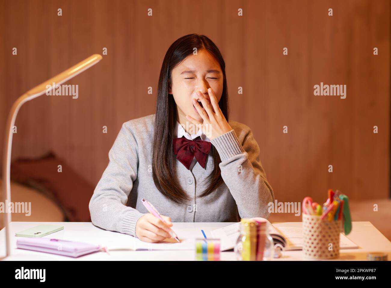 Japanese high school student in uniform studying Stock Photo - Alamy