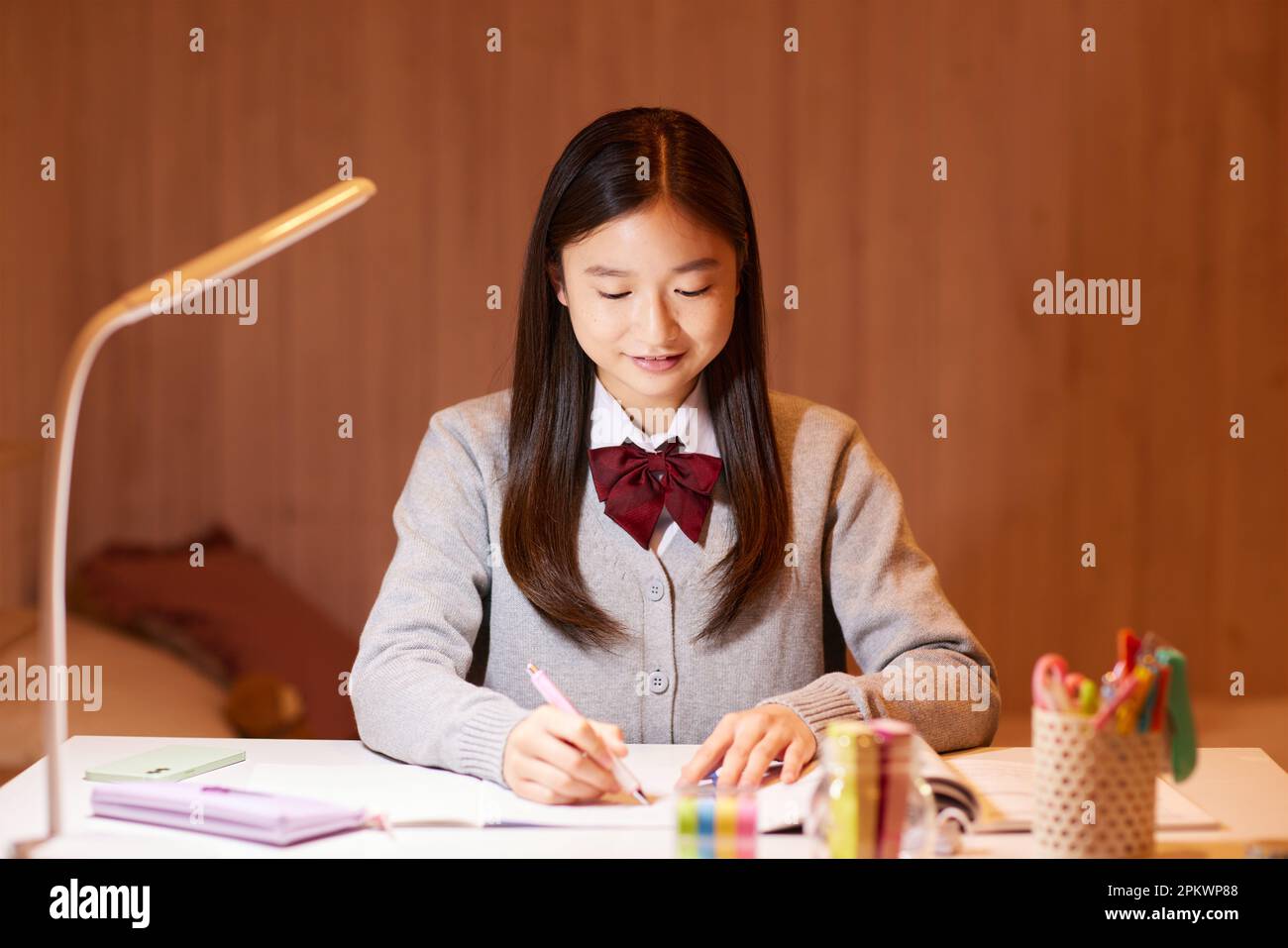Japanese high school student in uniform studying Stock Photo - Alamy