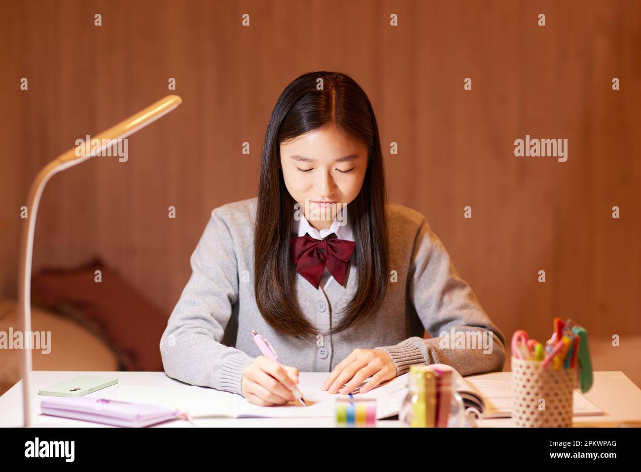 Japanese high school student in uniform studying Stock Photo - Alamy