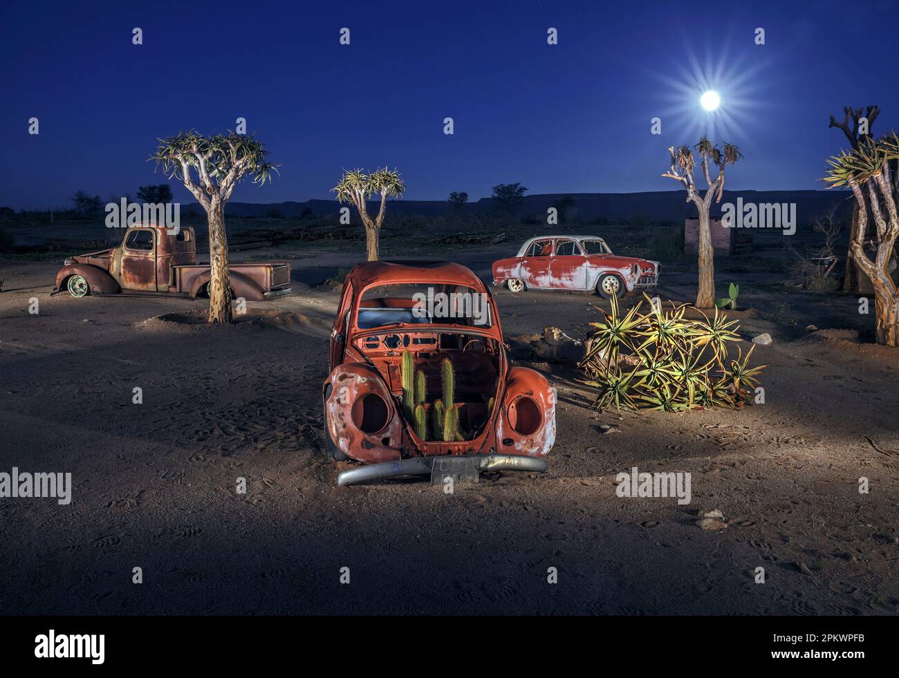 The full moon rises over the Klein Karasburg Mountains and old vintage ...