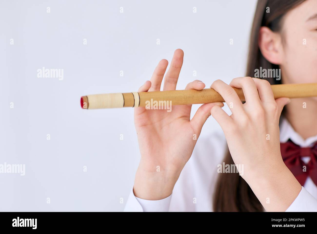 Japanese high school student wearing uniform practicing music Stock ...