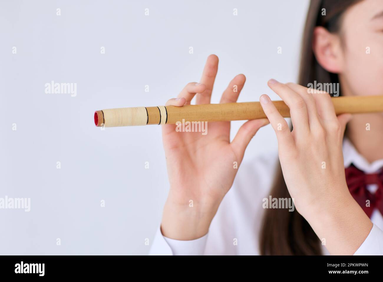 Japanese high school student wearing uniform practicing music Stock ...