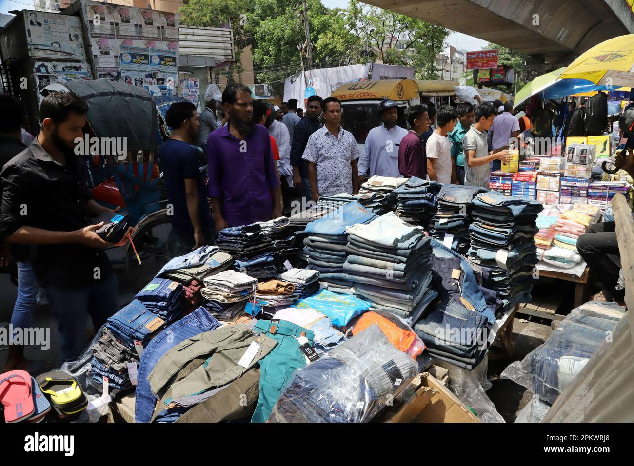 Non Exclusive: April 09 ,2023, Dhaka, Bangladesh: people help to lift the rubble of the past ...