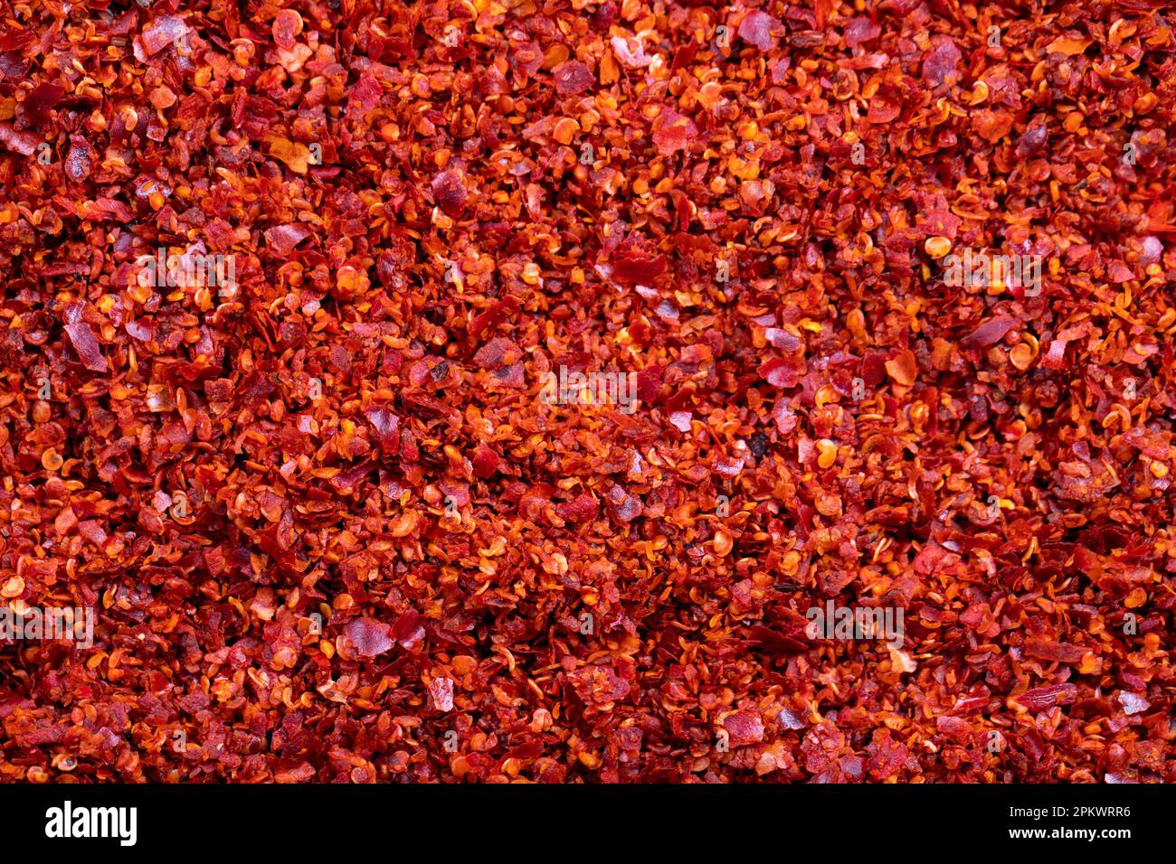 Dried red pepper flakes close-up. Spices and herbs. Chilli pepper ...