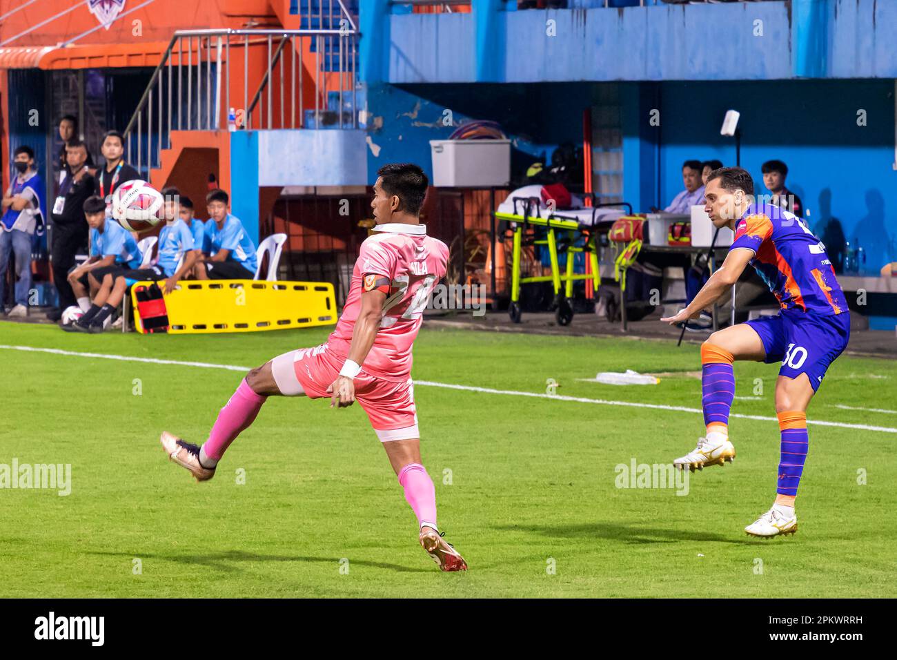 Football action during Thai league match at PAT stadium, Klong Toey ...