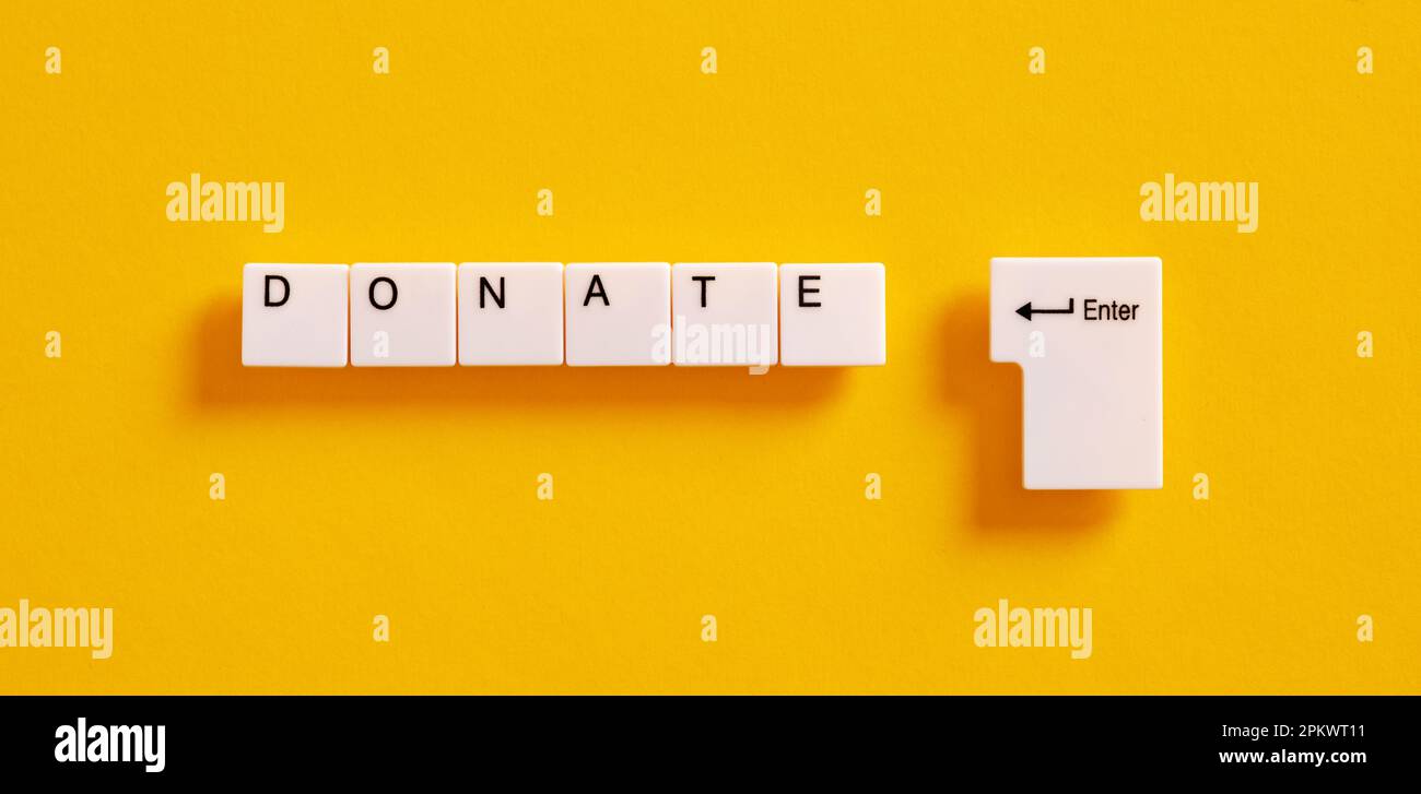 Online donation, charity and relief work concept. Computer keyboard ...