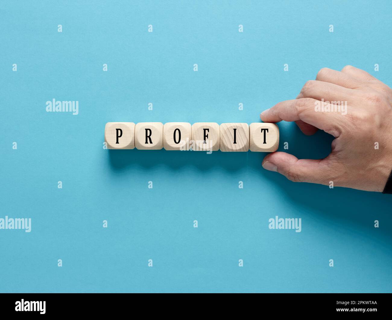 Strategic management for business profitability. Male hand arranges the ...