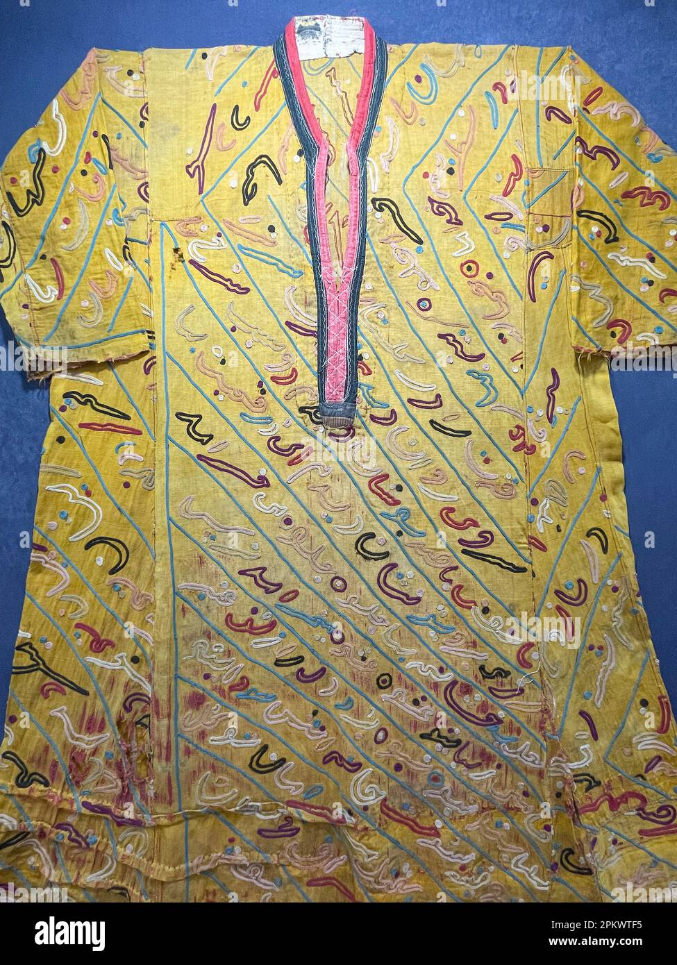 A traditional yellow Chapan, Caftan, Robe. At the Savitsky State Museum ...