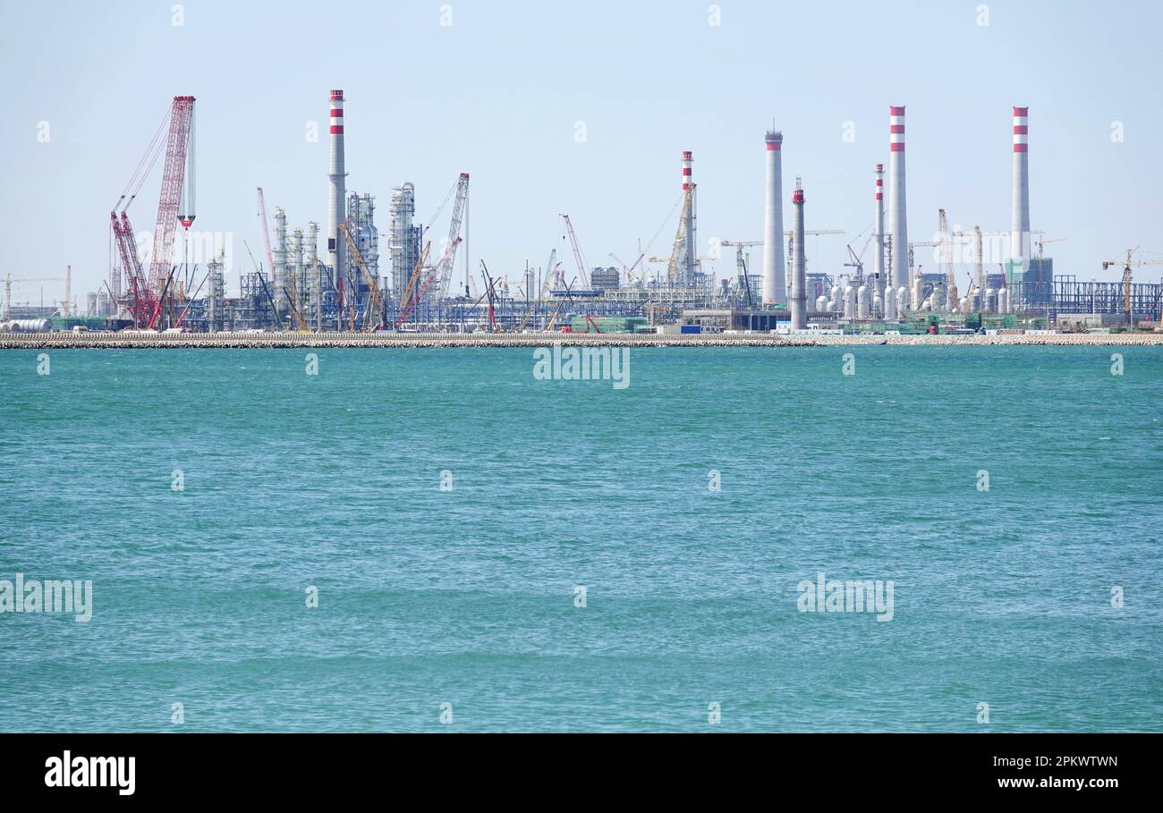 YANTAI, CHINA - APRIL 7, 2023 - Large production equipment is hoisted ...