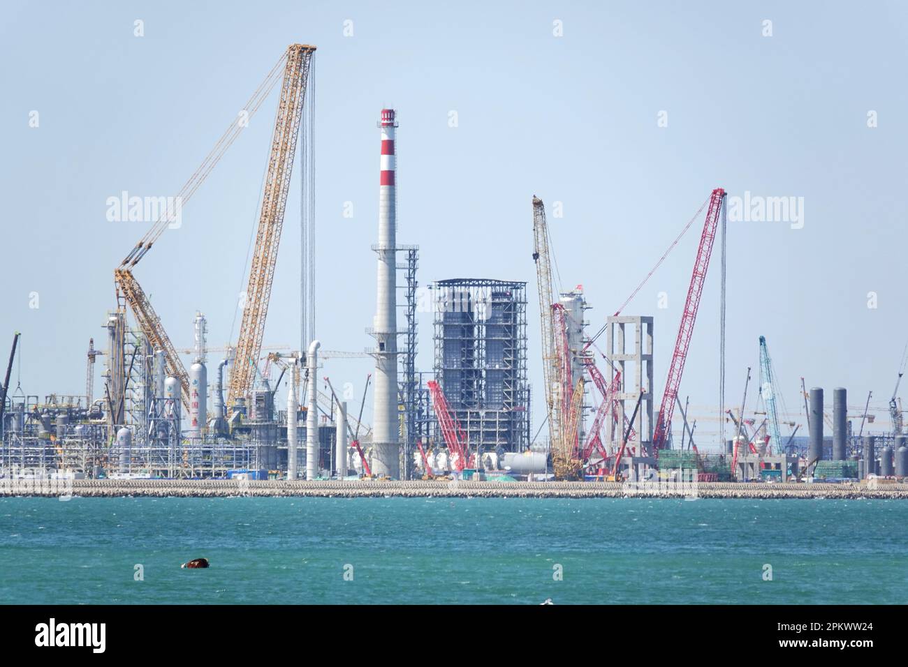 YANTAI, CHINA - APRIL 7, 2023 - Large production equipment is hoisted ...