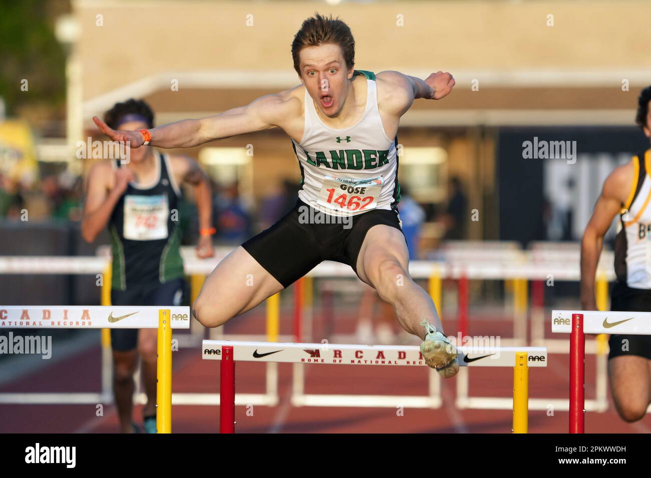 Gage Gose (1462) of Lander Valley wins the seeded 300m hurdles in 37.29 ...