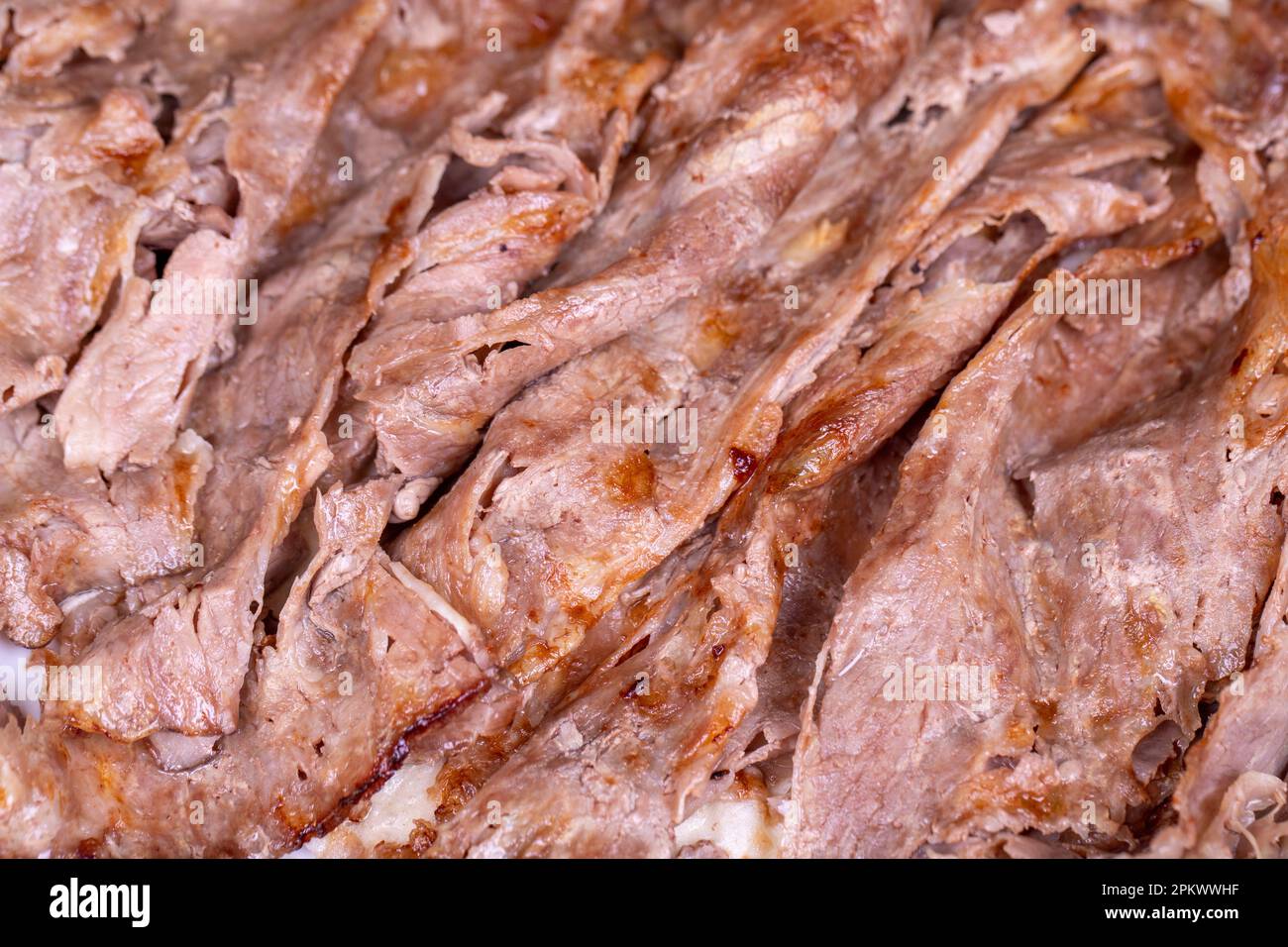 Meat doner kebab. Turkish doner kebab on wood floor. Turkish cuisine ...