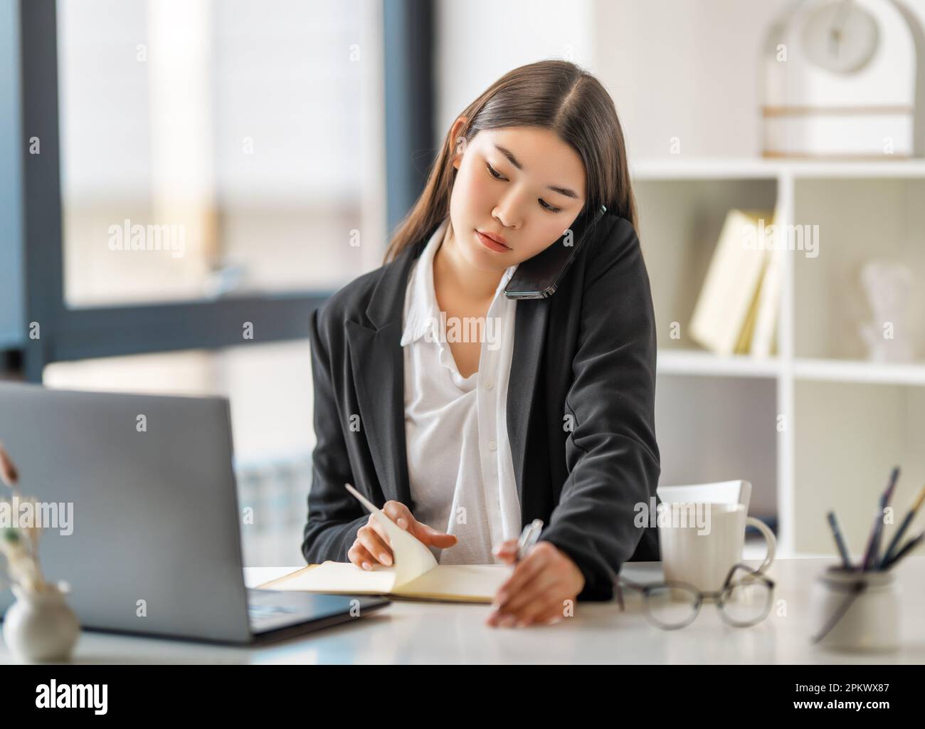 Young business lady working on laptop in office, Asian beautiful ...