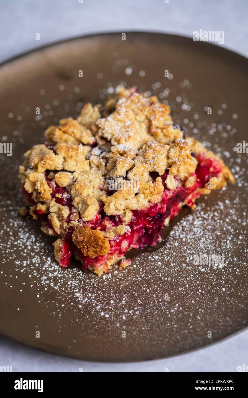 Red berries crumble bar Stock Photo - Alamy