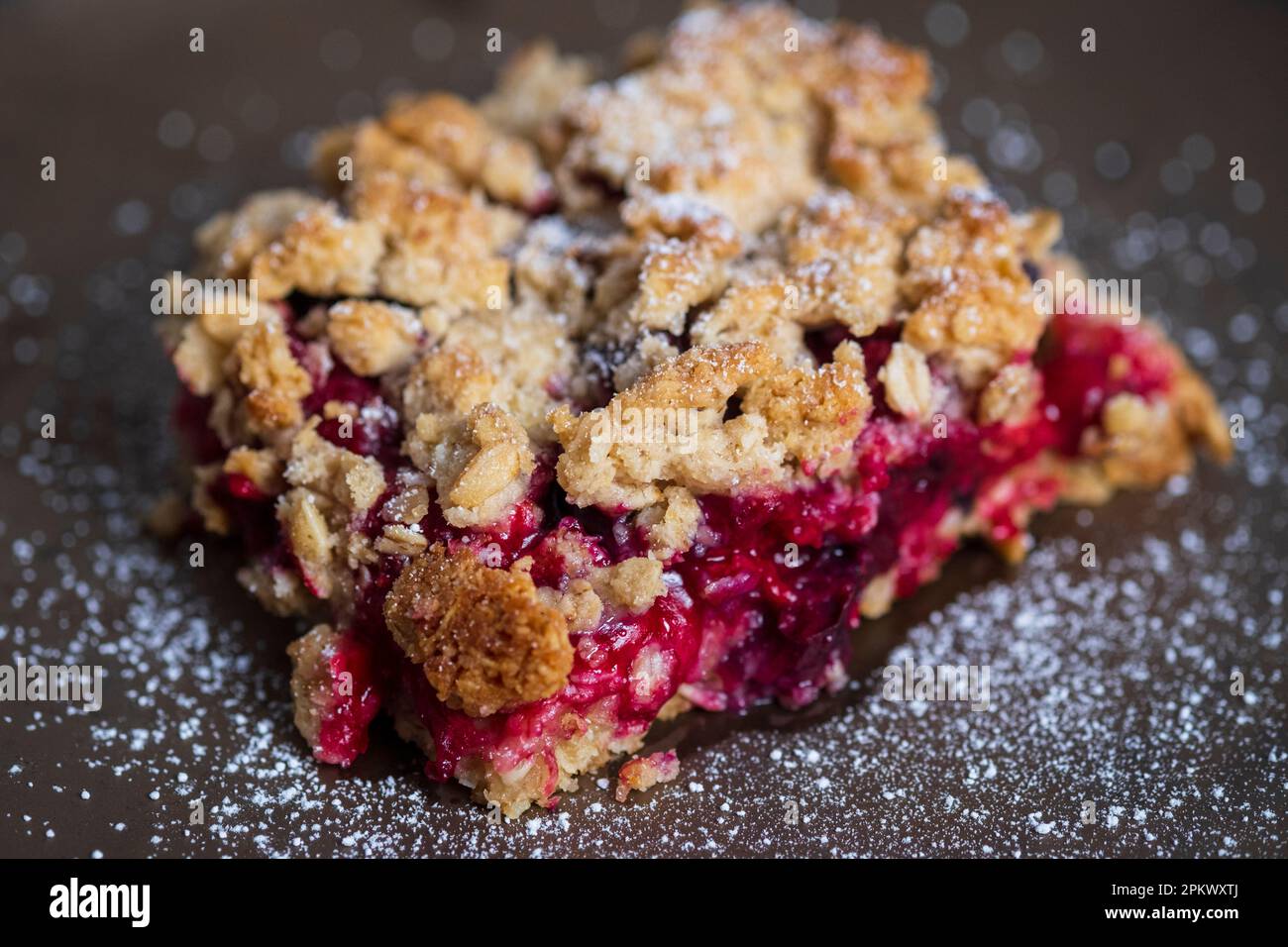 Red berries crumble bar Stock Photo - Alamy
