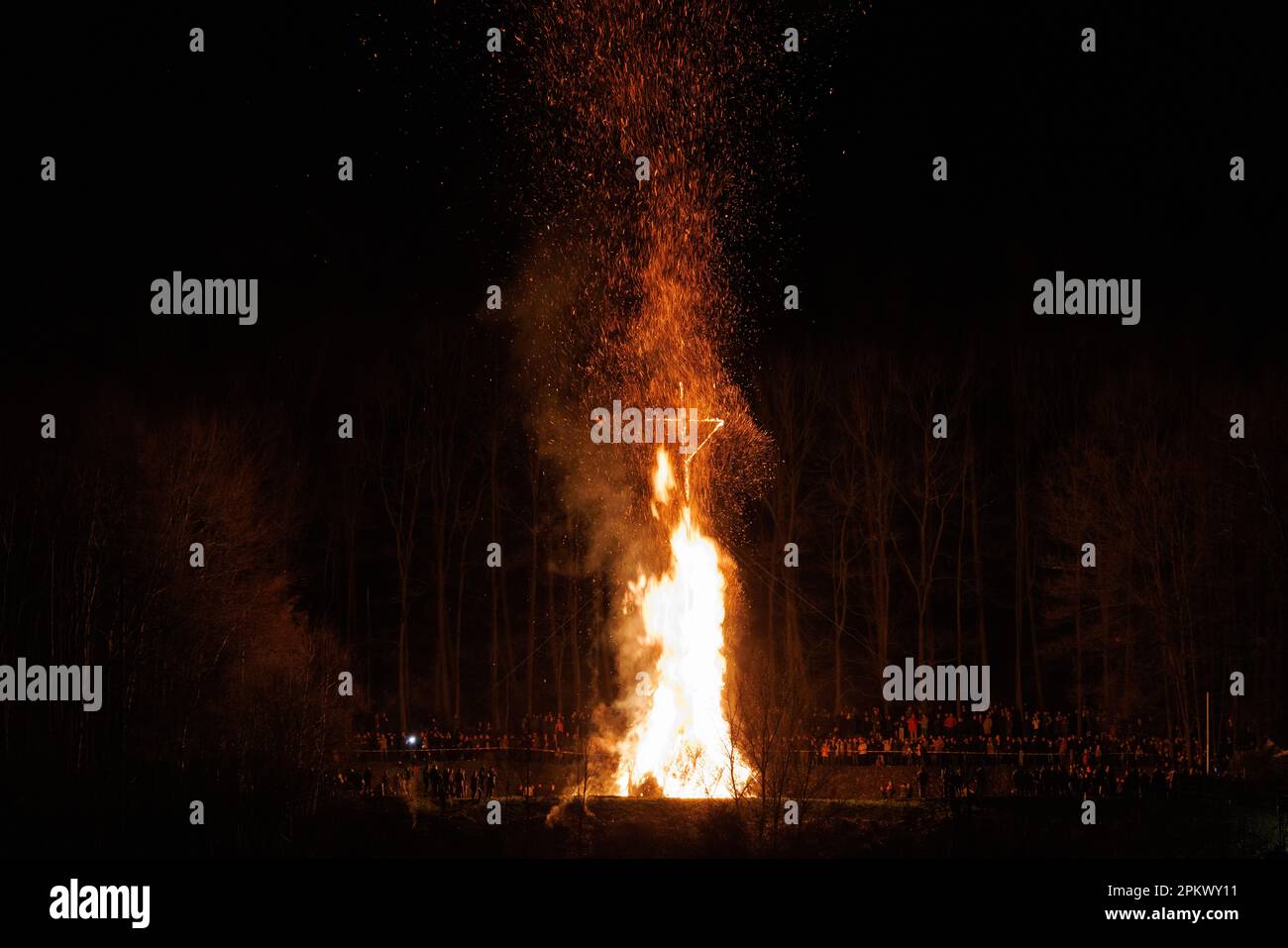 09 April 2023, North Rhine-Westphalia, Attendorn: An Easter fire, here ...