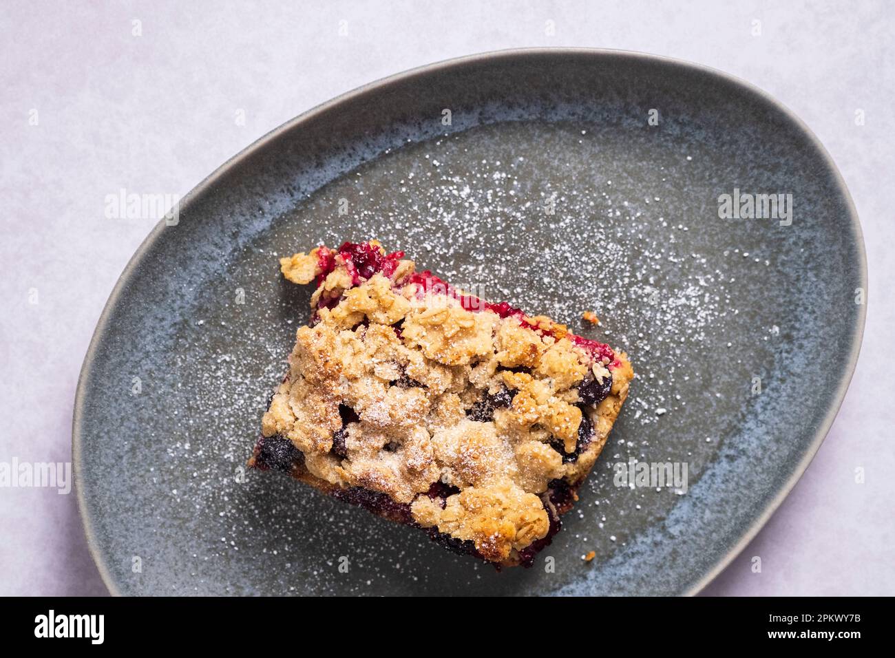Red berries crumble bar Stock Photo - Alamy