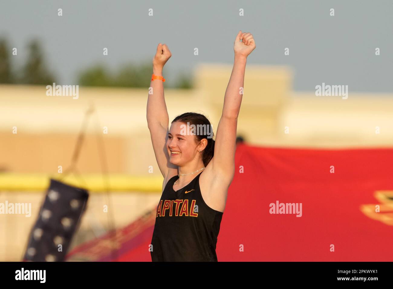 Hana Moll of Capital (Wash.) celebrates after winning the girls pole ...