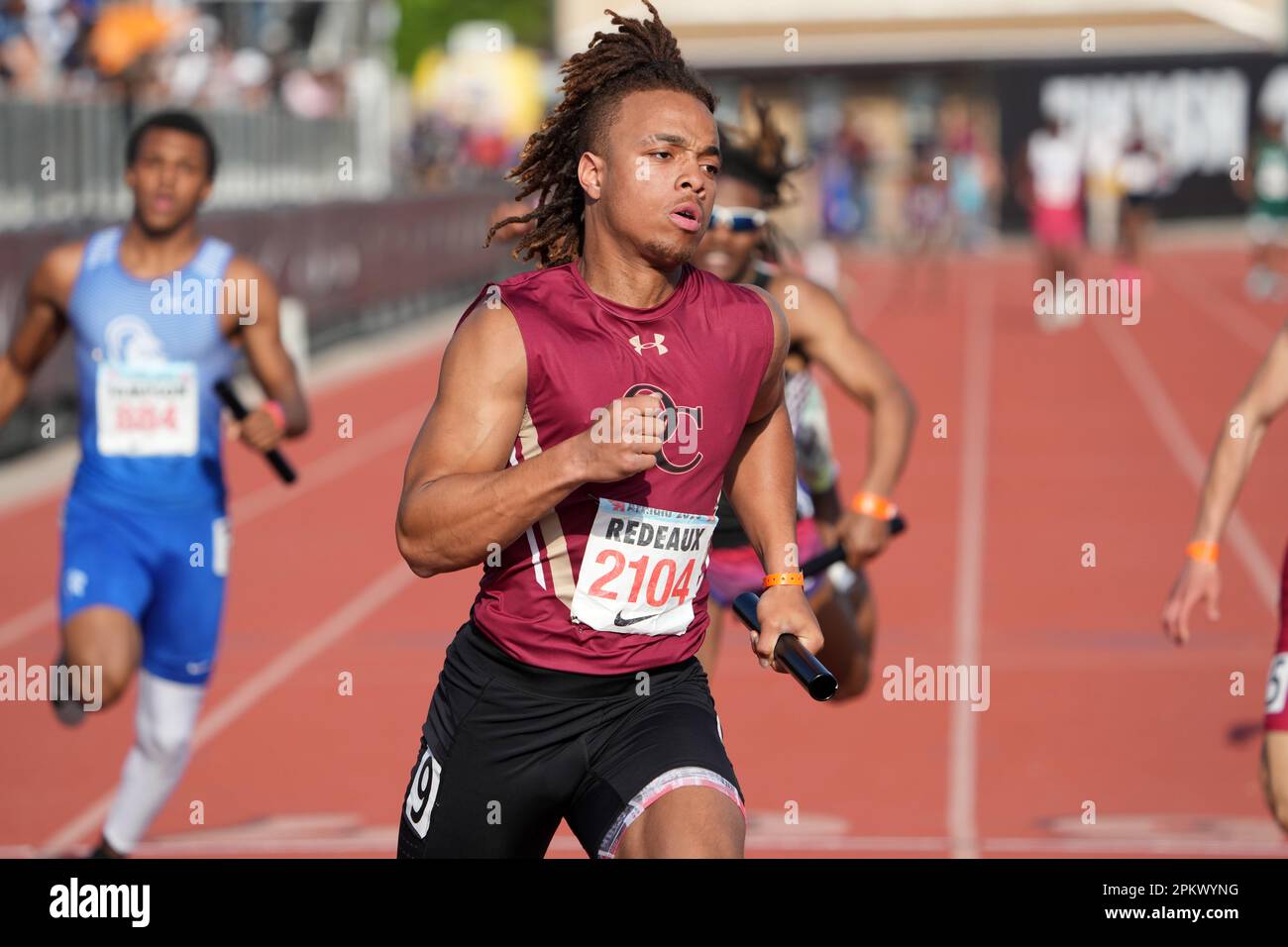 Deshonne Redeaux (2104) runs the anchor leg on the Oaks Christian 4 x ...