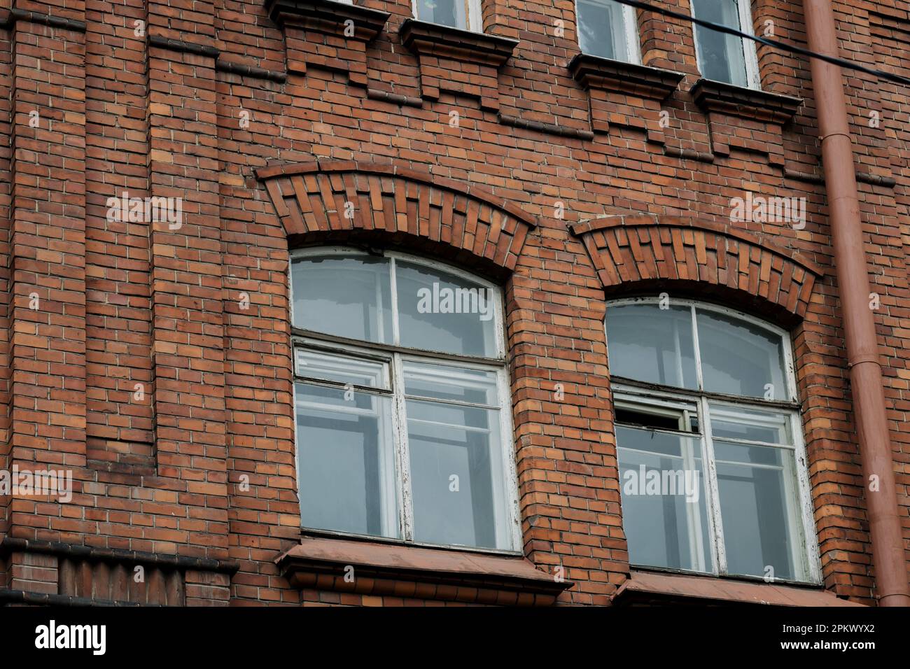 Old brick building with wooden windows. vintage warehouse Stock Photo ...