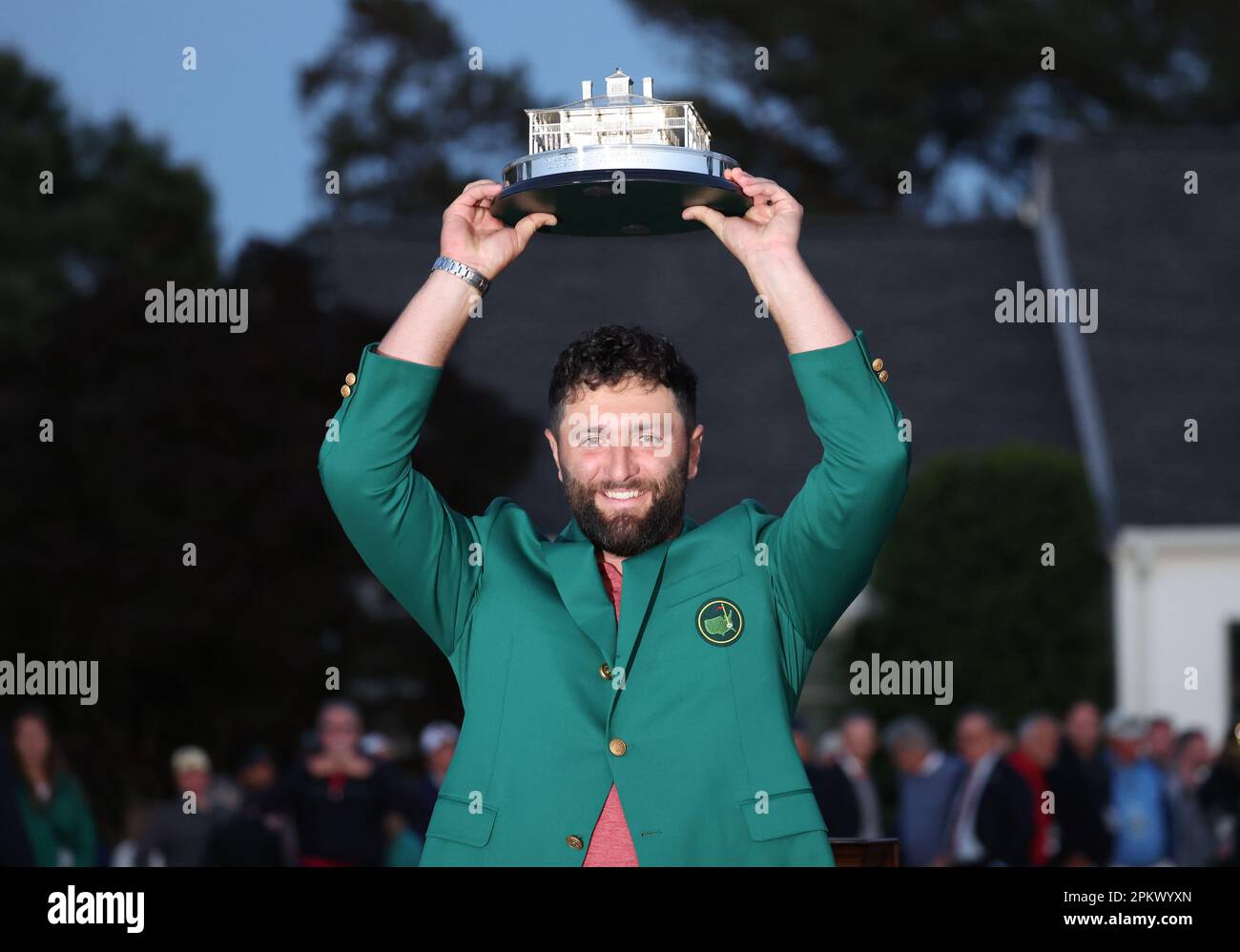Masters champion Jon Rahm celebrates with the trophy after winning the ...