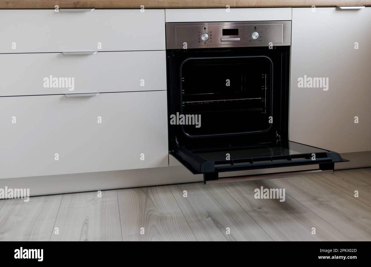 Open modern oven built in kitchen furniture. New electric oven Stock ...