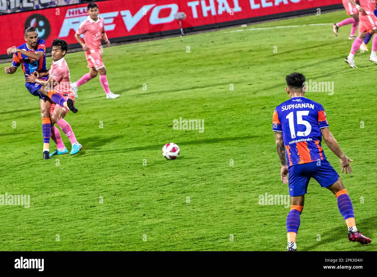 Football action during Thai league match at PAT stadium, Klong Toey ...