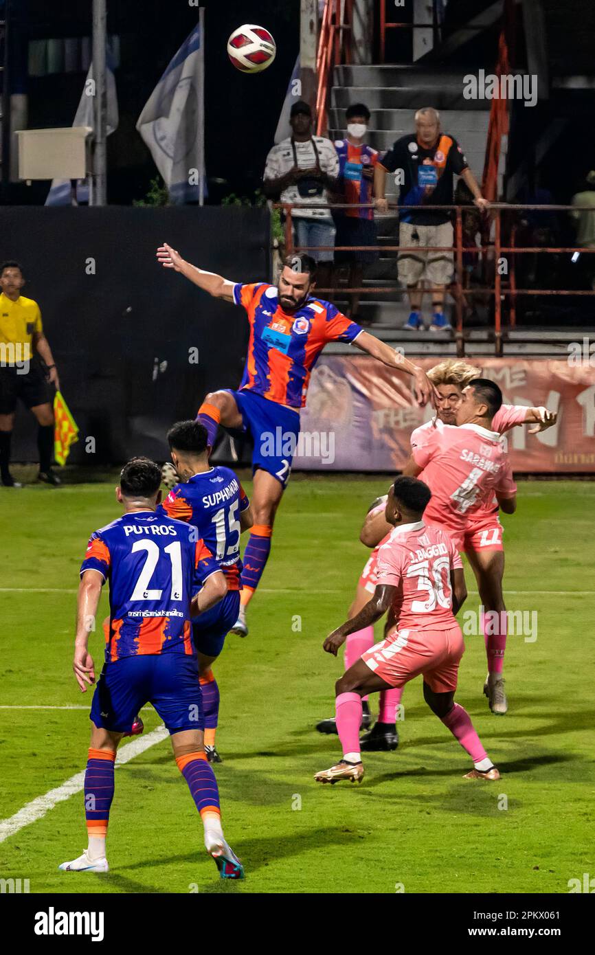 Football action during Thai league match at PAT stadium, Klong Toey, Bangkok, Thailand between ...
