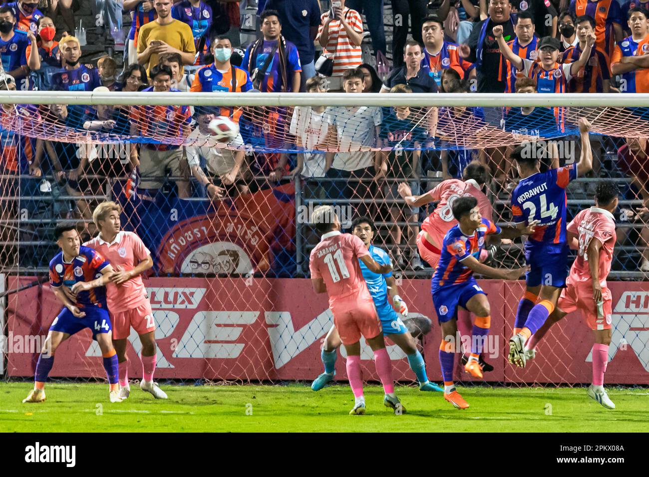 Football action during Thai league match at PAT stadium, Klong Toey, Bangkok, Thailand between ...