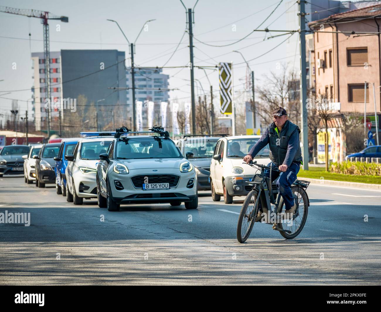 Commuter cars and a bicycle hi-res stock photography and images - Alamy