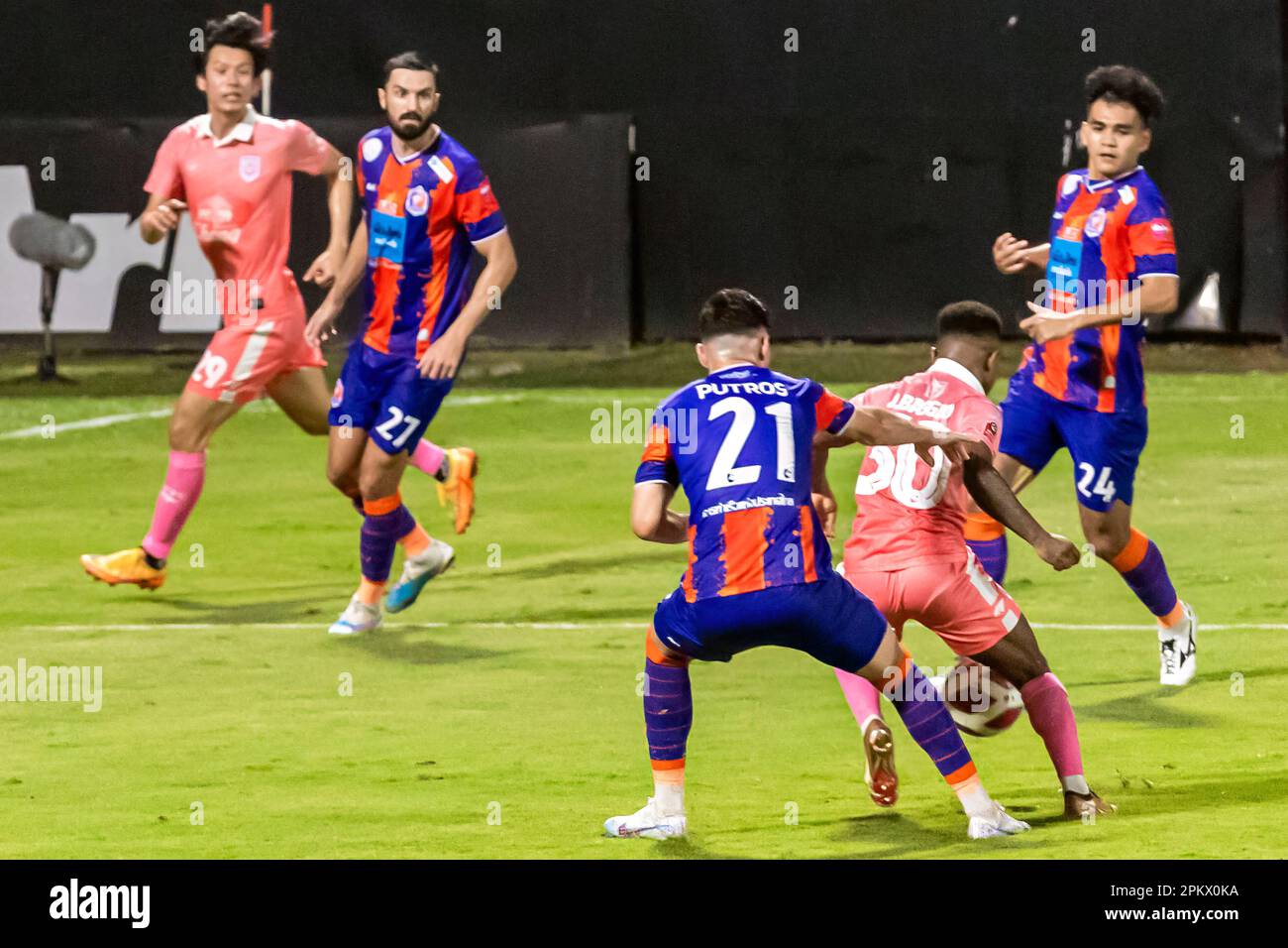 Football action during Thai league match at PAT stadium, Klong Toey ...