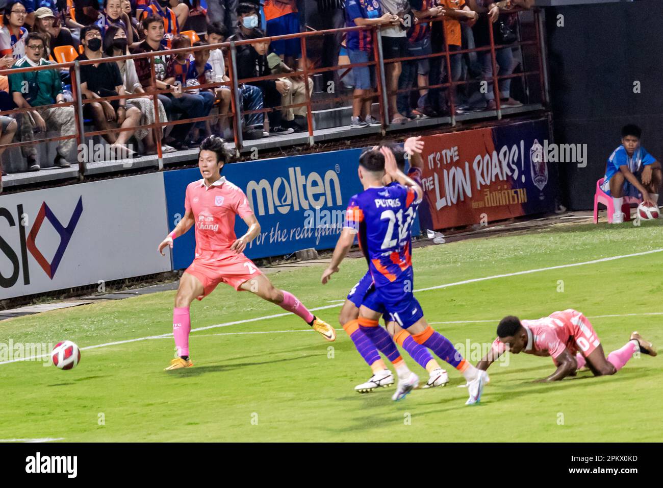 Football action during Thai league match at PAT stadium, Klong Toey ...