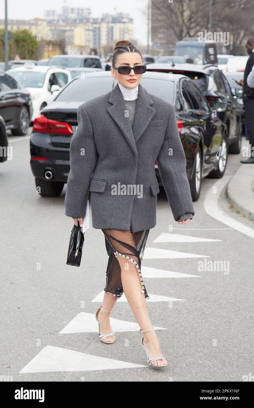 MILAN, ITALY - FEBRUARY 23, 2023: Alexandra Pereira with gray jacket ...