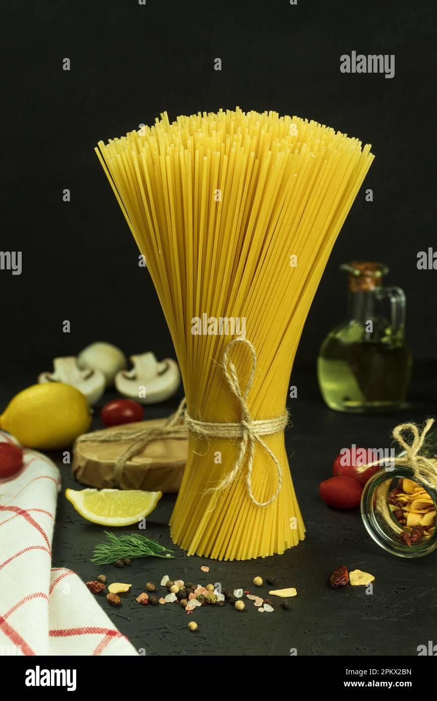 Spaghetti dry, A bunch of spaghetti tied with a rope. Pasta, high ...