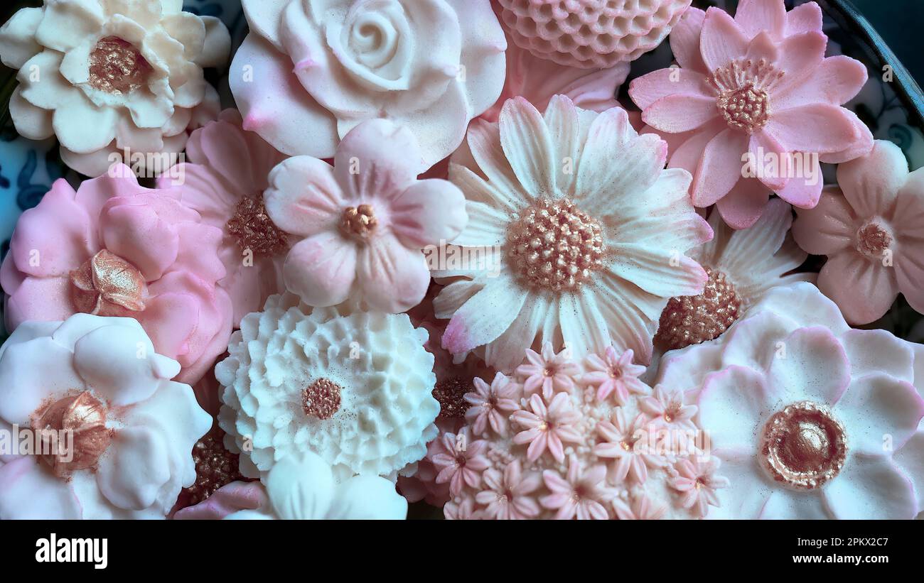 Close up Thai dessert various flower shaped in pastel pink color tone ...