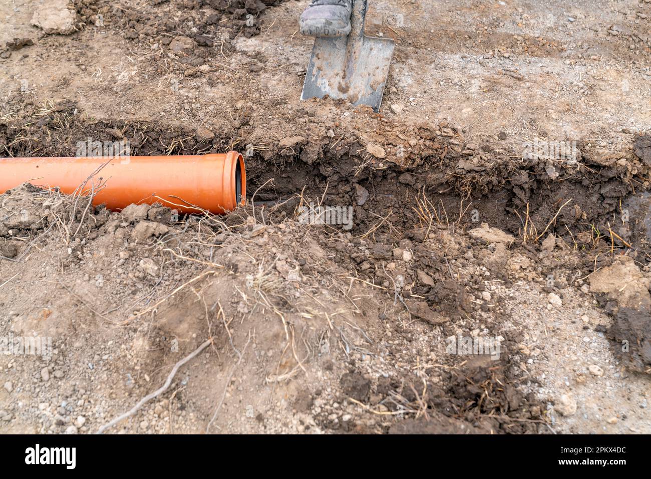 plastic pvc waste sewer pipe in the ground. construction site Stock ...