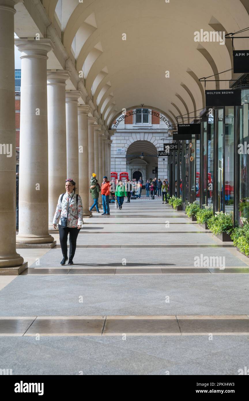 View along the shops colonnade in Royal Opera House Arcade on Covent ...
