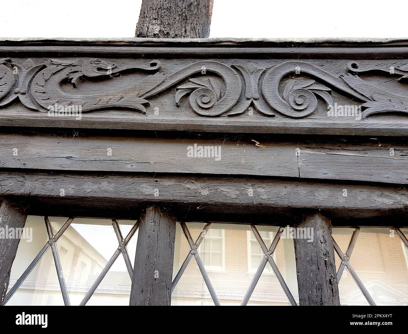 Carved wooden details over a lattice window Stock Photo - Alamy
