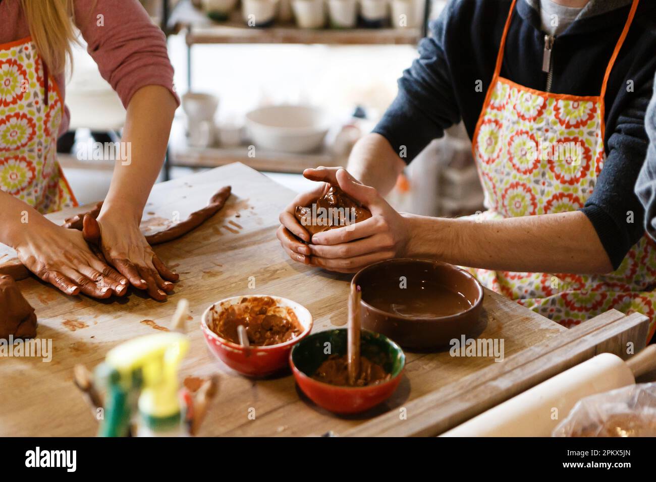 Student hands molding clay hi-res stock photography and images - Alamy