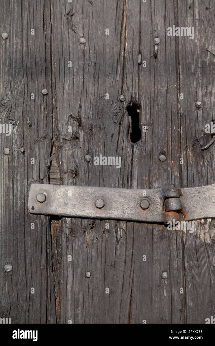 Finland, Oulu, keyhole and old hinge on door of granary building Stock ...