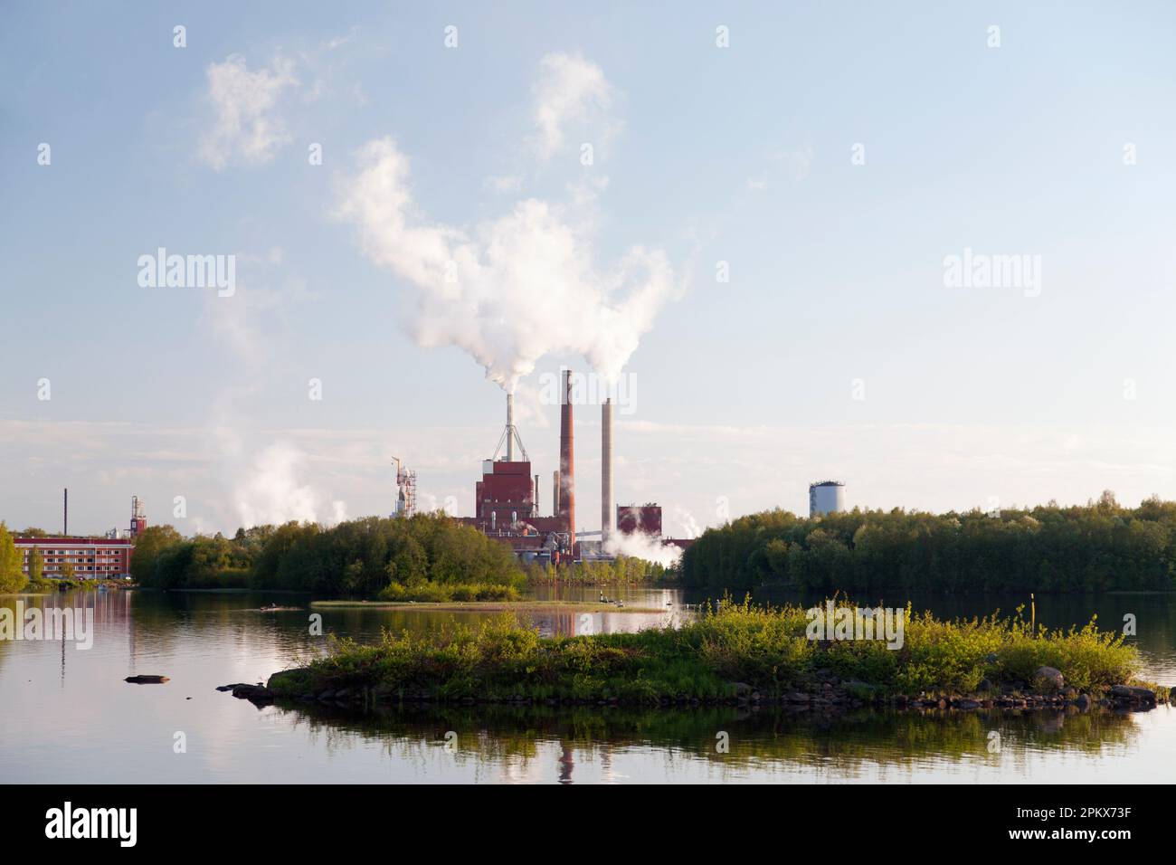 Finland, Oulu, paper and pulp factory as seen from the Oulu waterfront ...