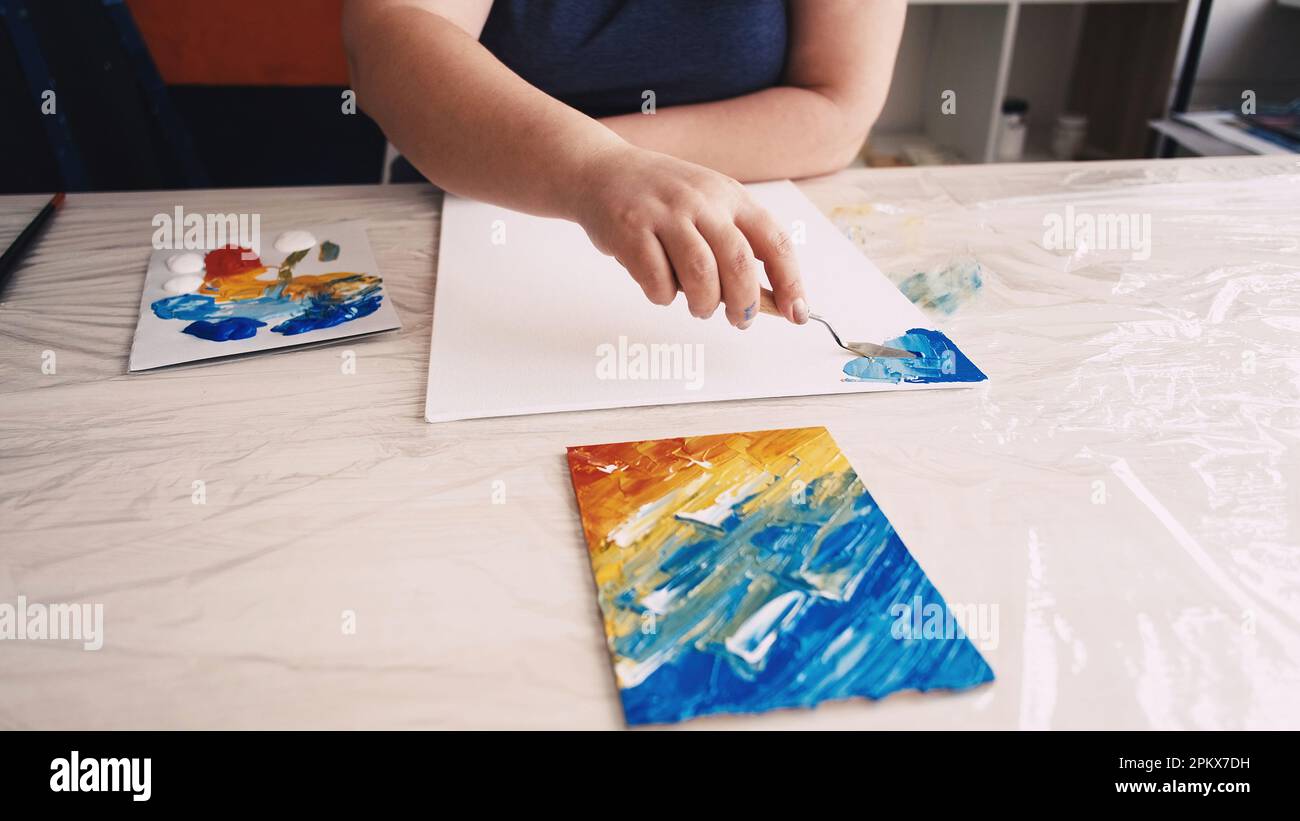 Artwork creation female artist abstract picture Stock Photo - Alamy