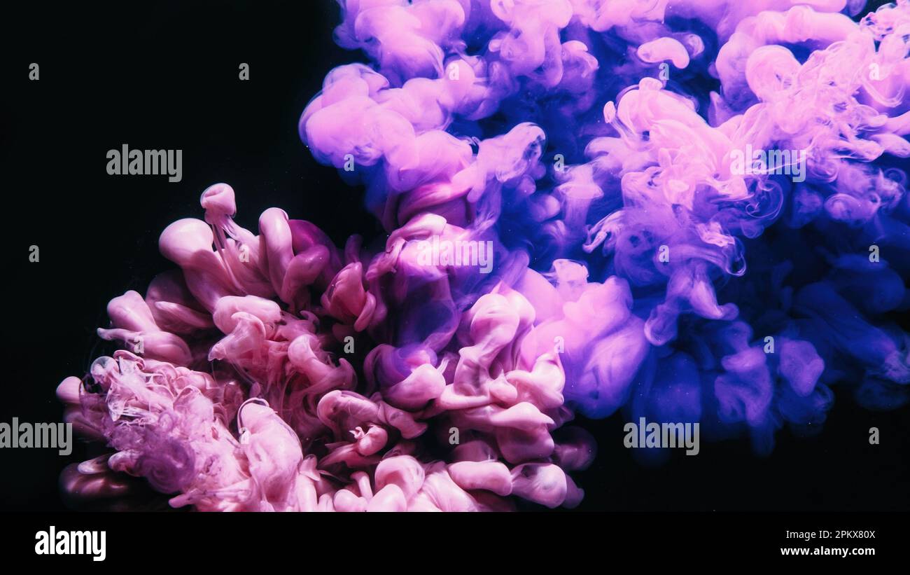 Ink water paint drop smoke cloud blue pink splash Stock Photo - Alamy