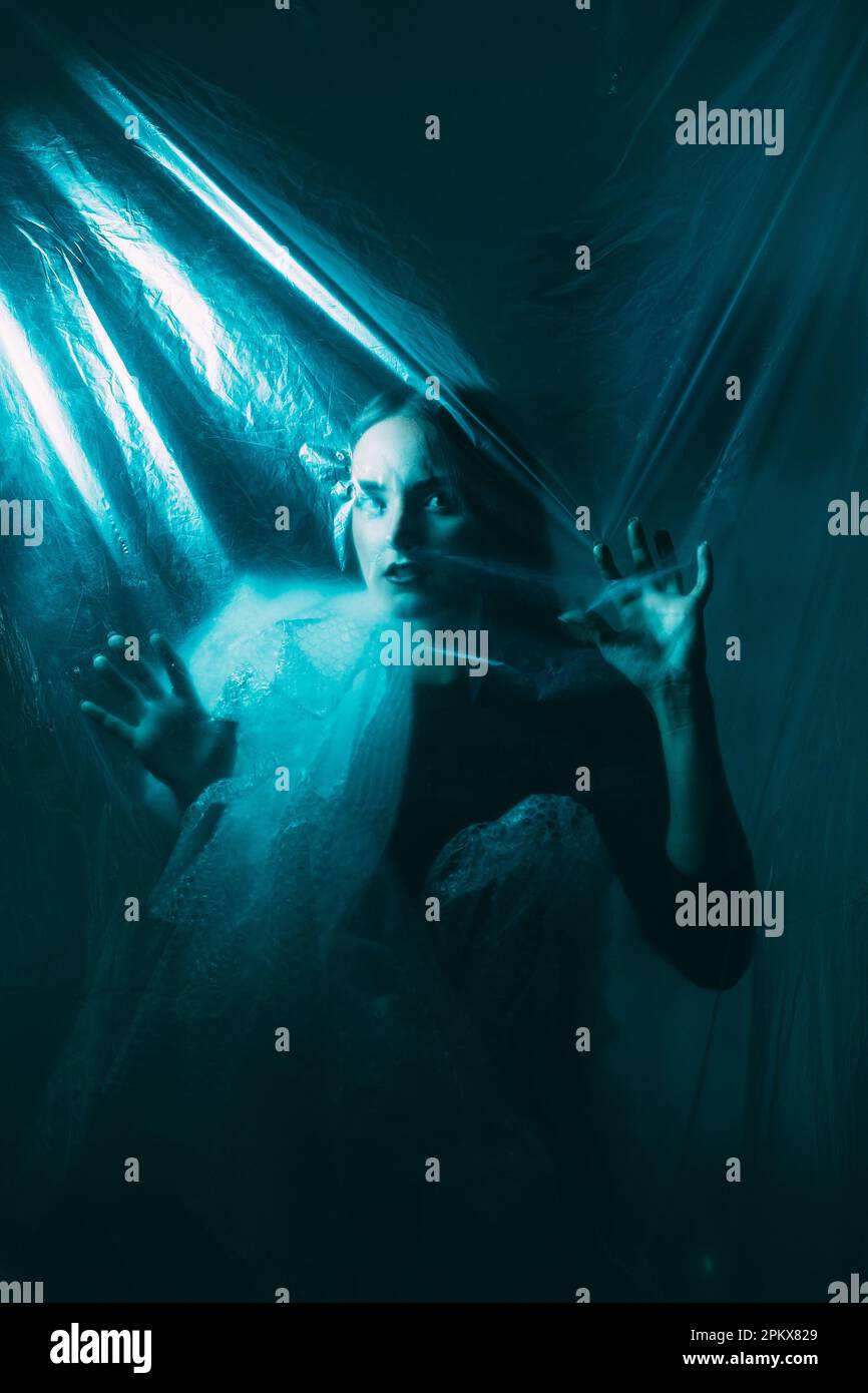 Horror fear night terror scared woman trapped dark Stock Photo - Alamy