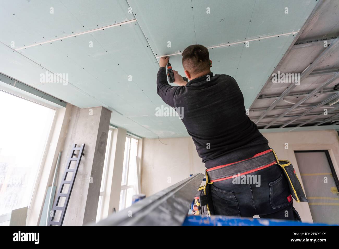 Ceiling installation with expert technicians In the room that is in the ...