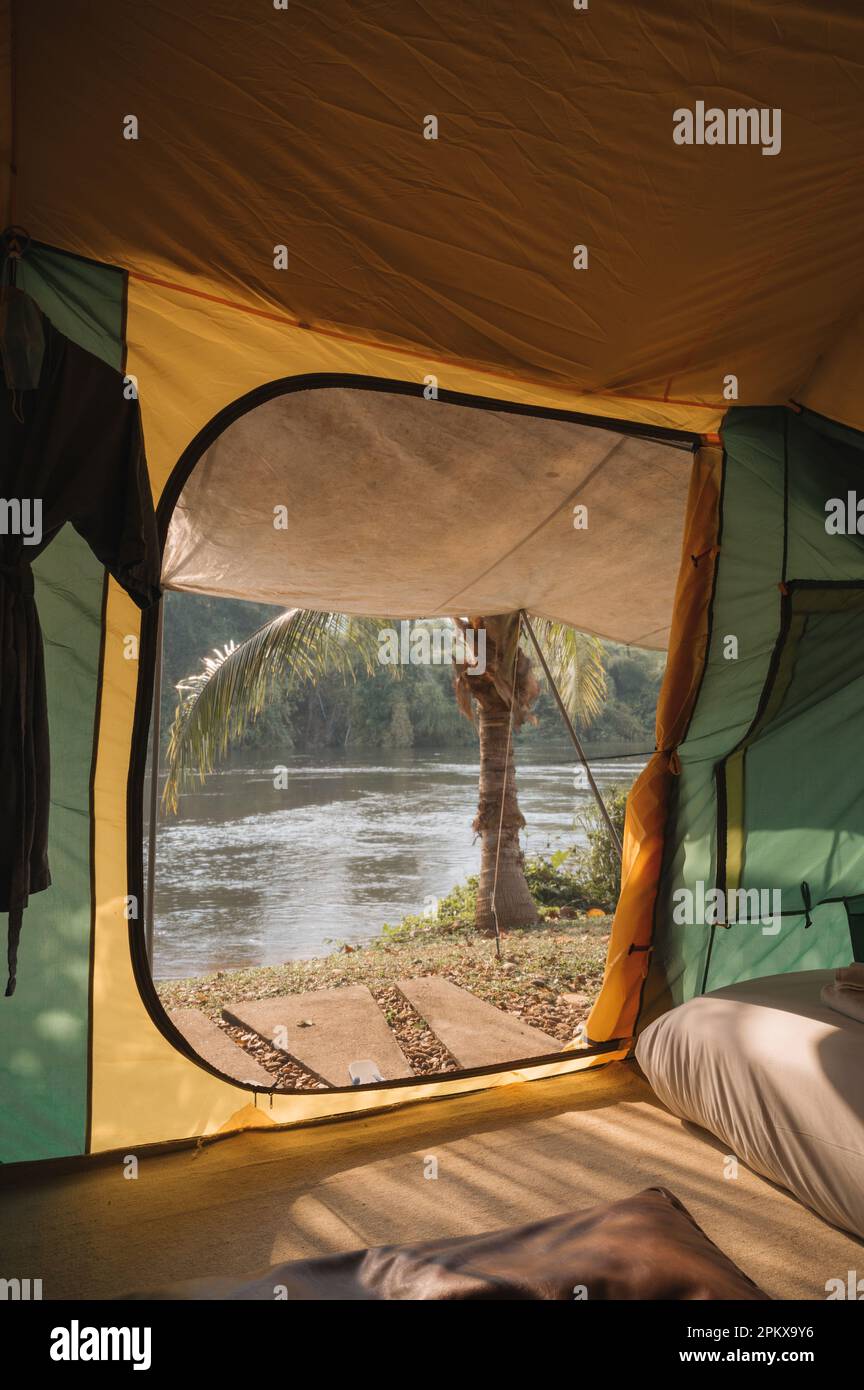 Inside of large comfortable camping tent on campground in the tropical ...